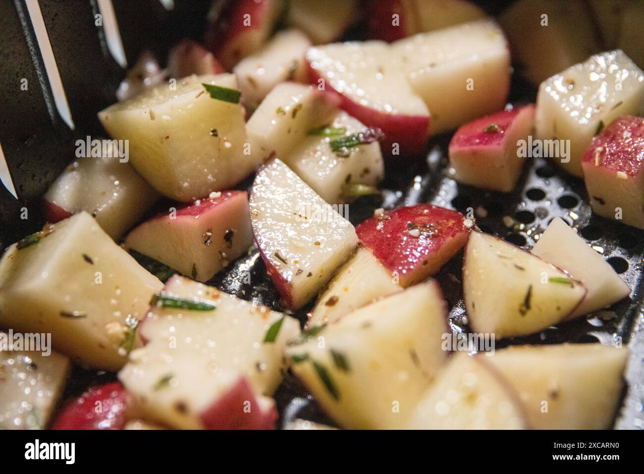 Diced seasoned raw potatoes hi-res stock photography and images - Alamy