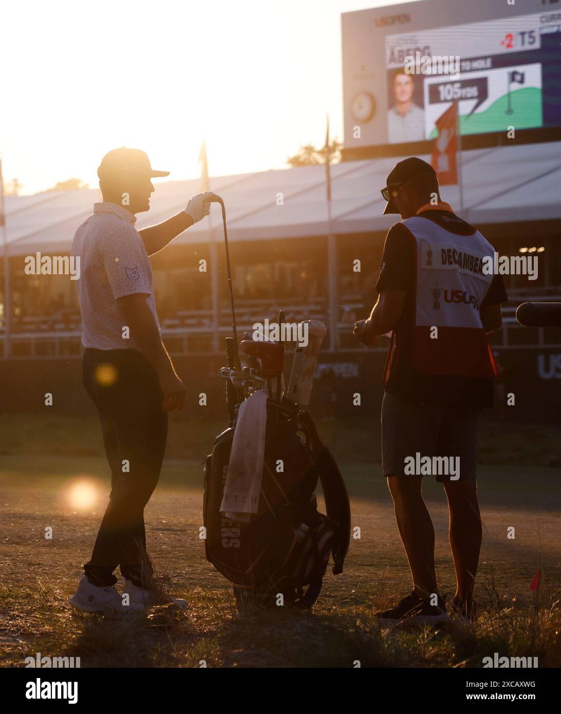 Pinehurst, United States. 16th June, 2024. Bryson DeChambeau and caddie ...