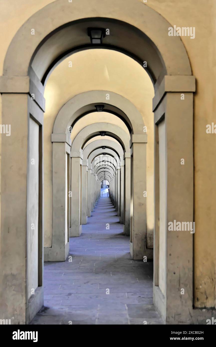 Florence, Tuscany, Italy, Europe, Historic arcades with vaults and a ...