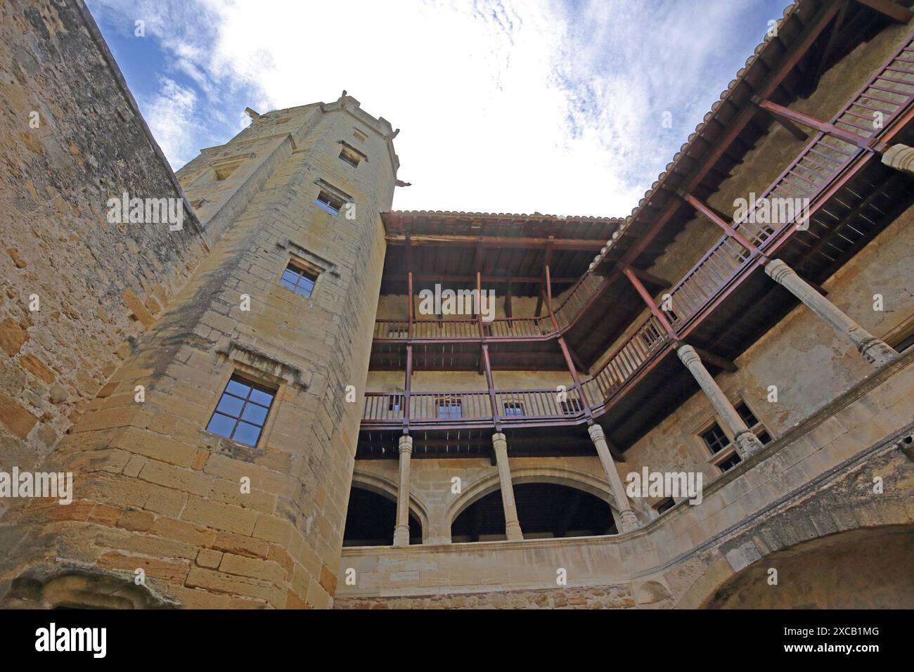 Inner courtyard with arcade, columns and tower of the chateau built in ...
