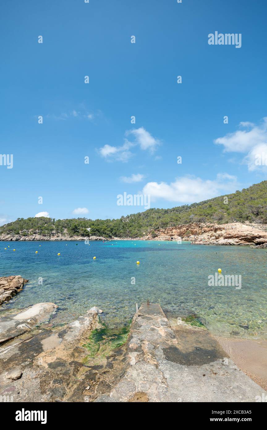 Cala Saladeta, Ibiza, Spain: 2024 May 16: People on the beach of Cala ...
