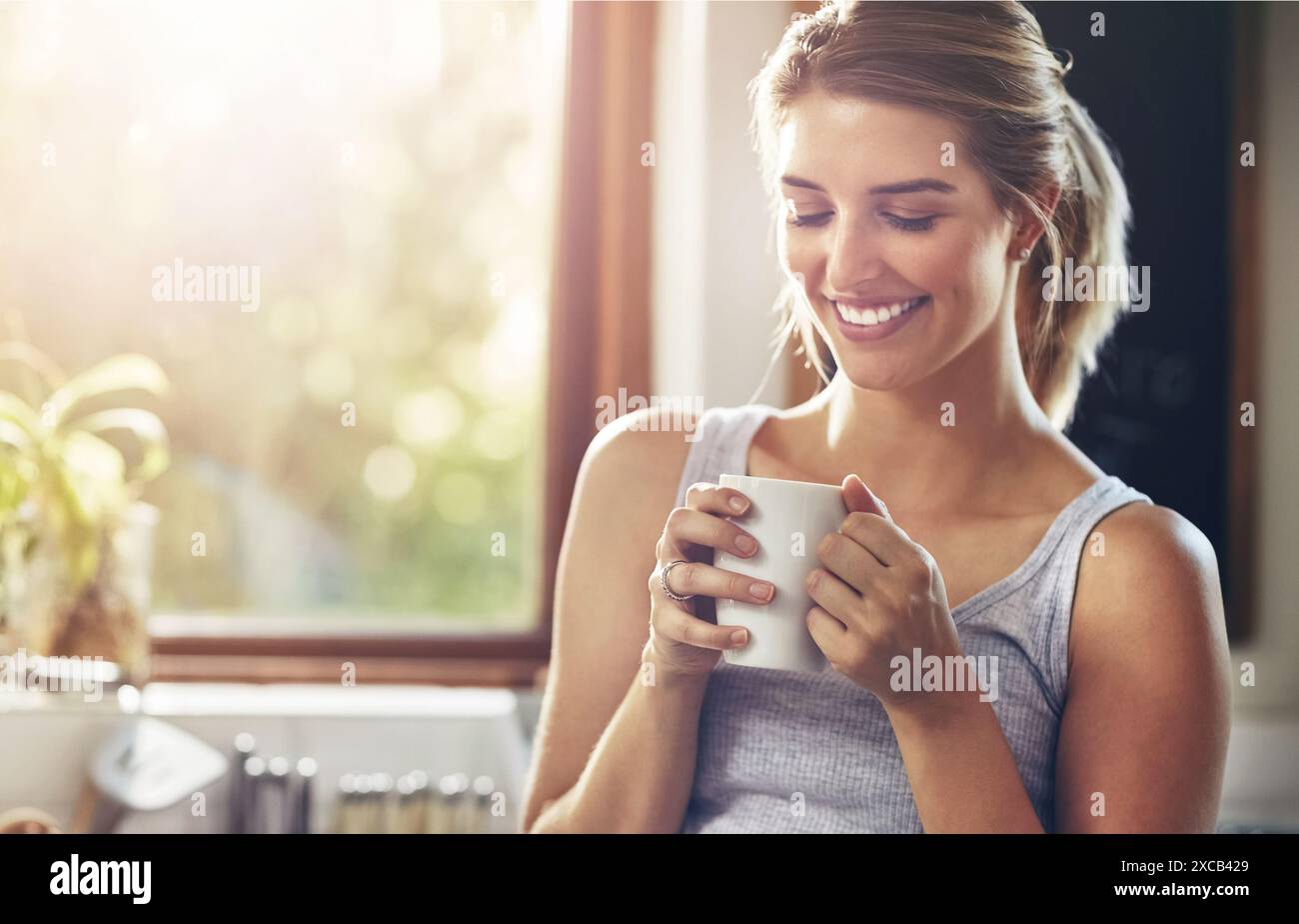 Home, smile and woman with coffee in morning for caffeine, beverage and ...