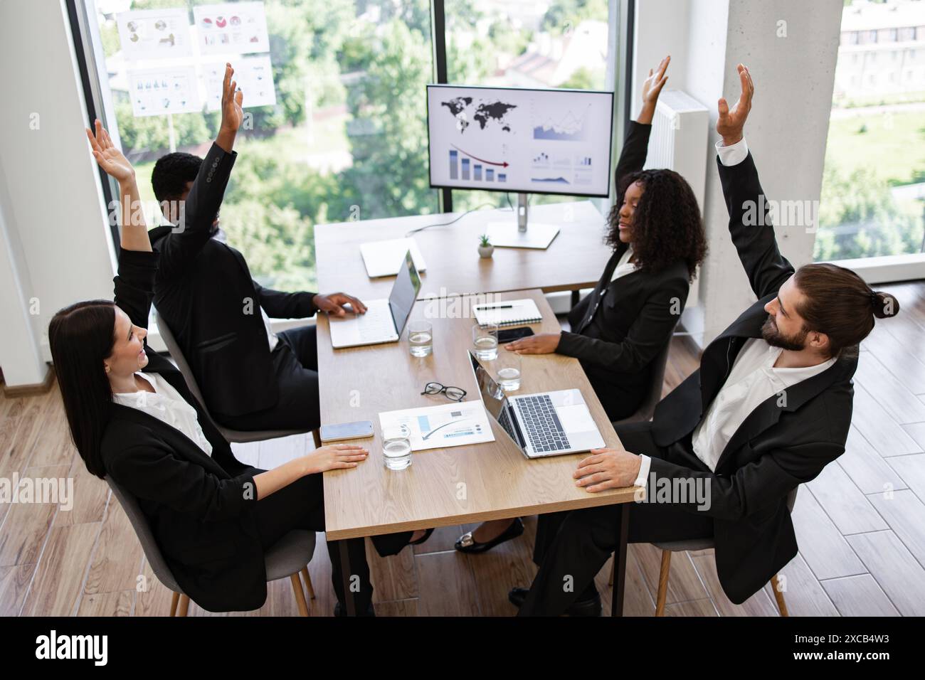 Successful businessman celebrating completion hi-res stock photography ...