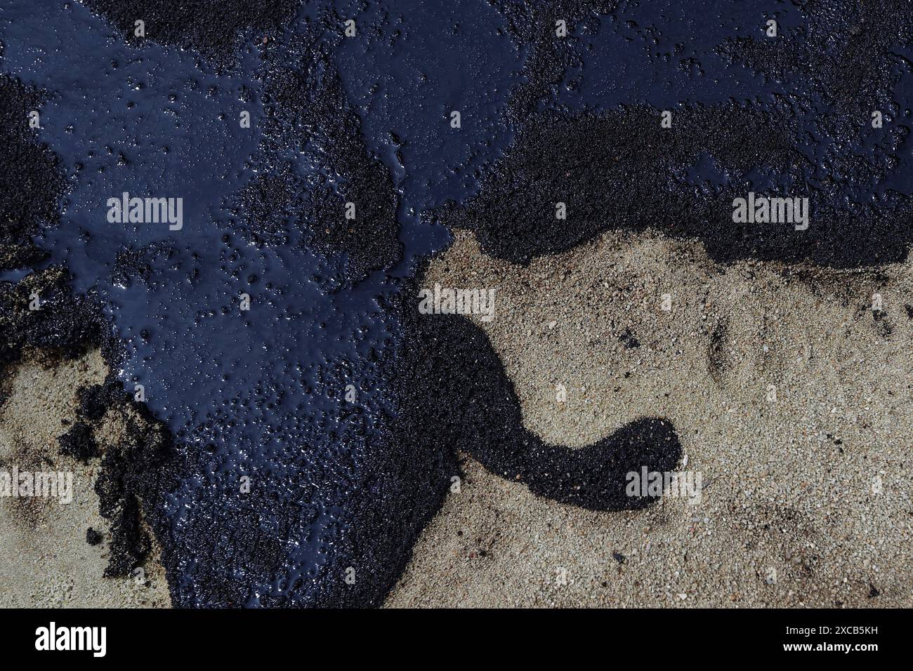 Part of oil spill is seen along Sentosa's Tanjong Beach area in ...