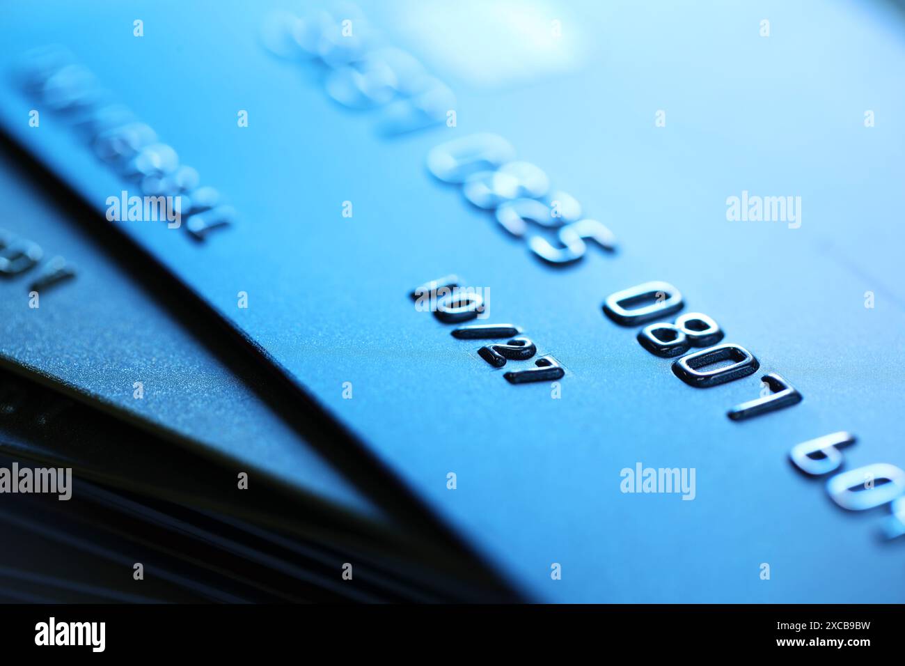 Many credit card as background, macro view Stock Photo - Alamy