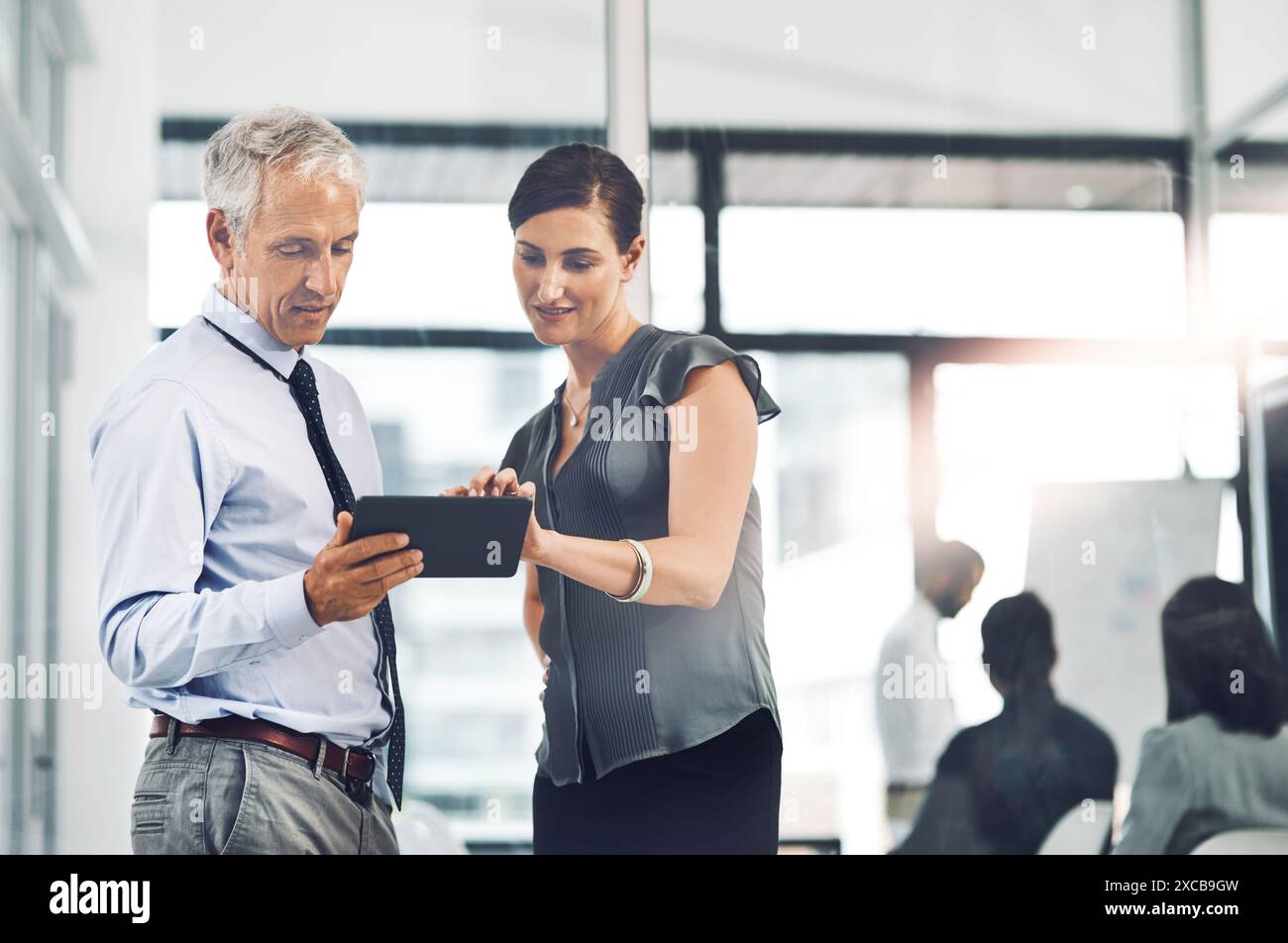 Business people, tablet and brainstorming for teamwork, partnership and ...