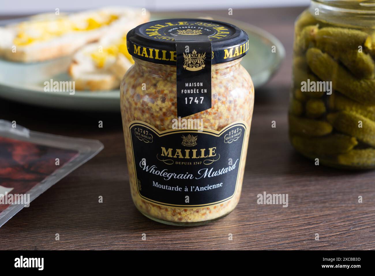 Maille Wholegrain mustard jar in a kitchen, England. Concept: European ...