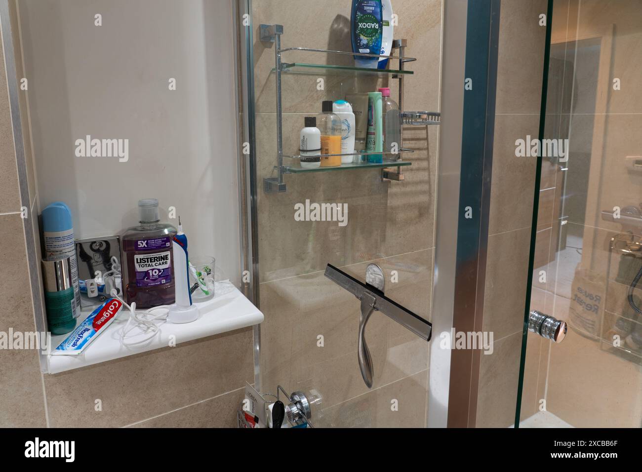 British bathroom interior with toiletries, mouthwash, toothbrush ...