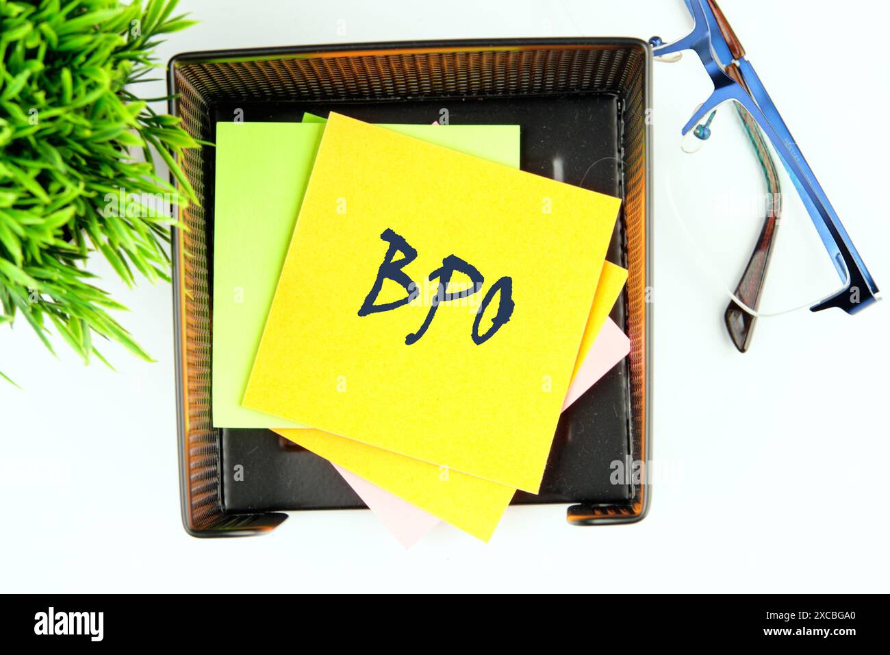 Text BPO Business Process Outsourcing on a yellow sticker in a stand on ...