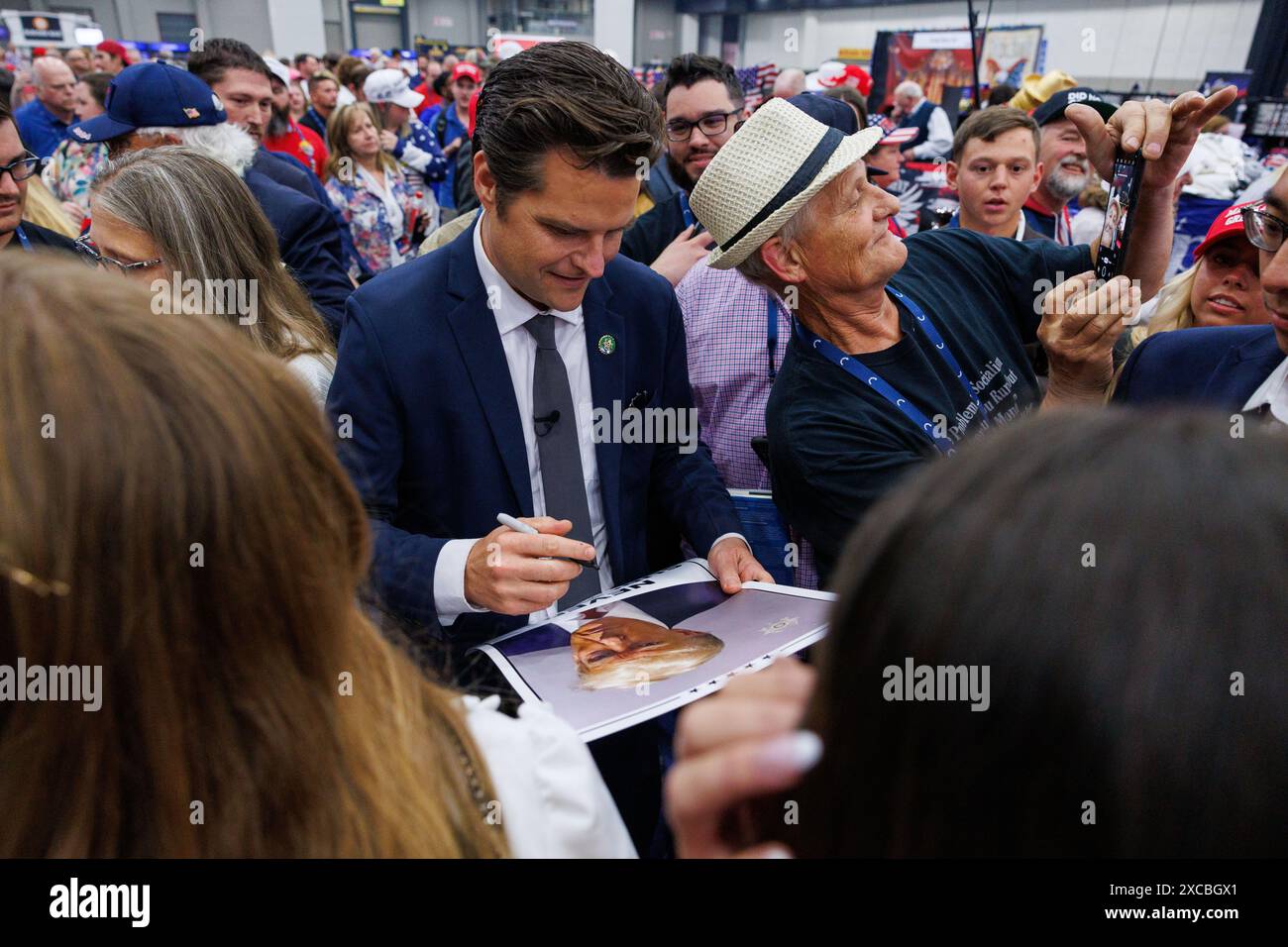 U.S. Rep. Matt Gaetz (R-Fla.) mingles with audience members at a ...