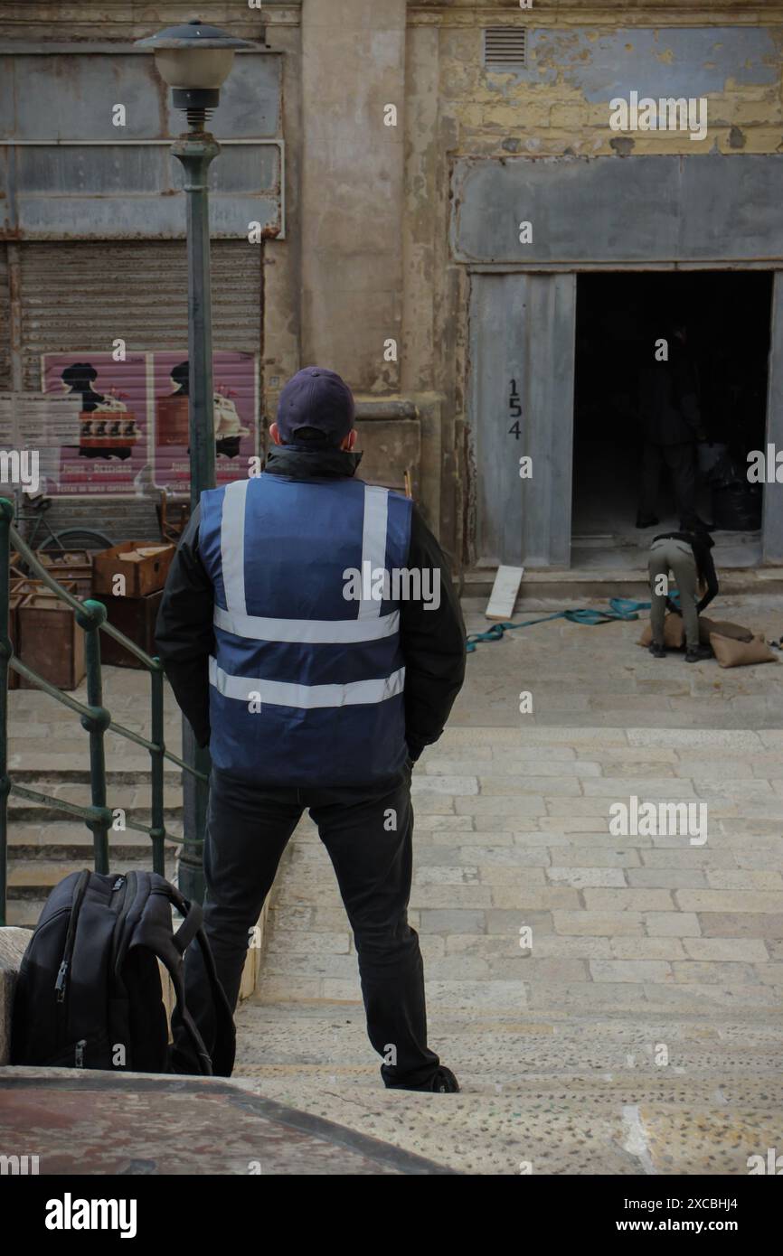 security standing on the street Stock Photo - Alamy