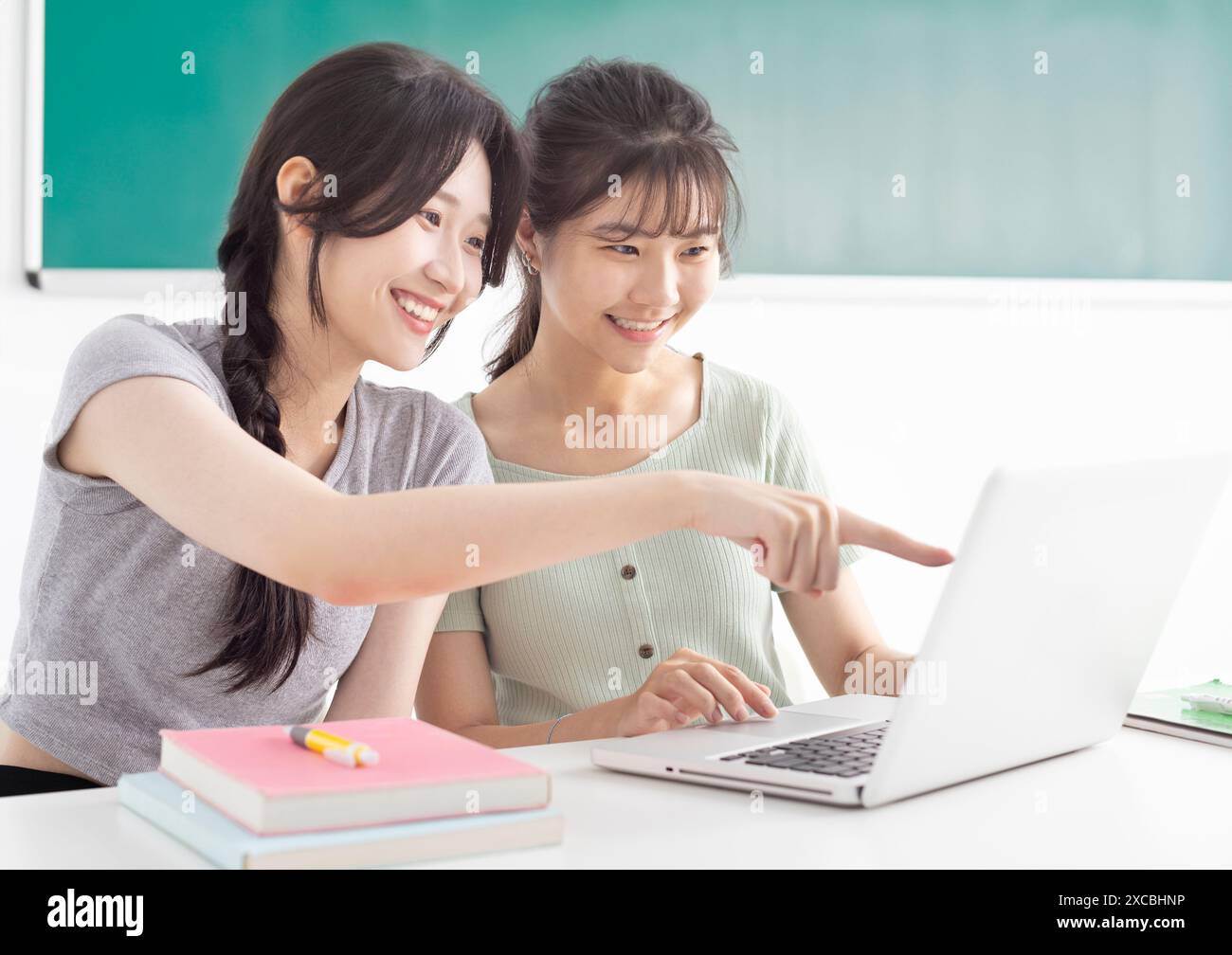 Study together laptop hi-res stock photography and images - Alamy