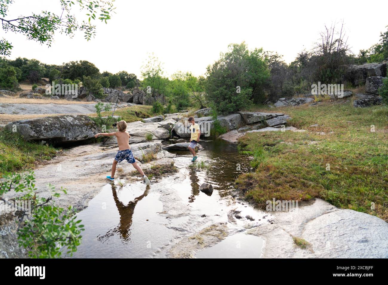 Children jumping off hi-res stock photography and images - Alamy