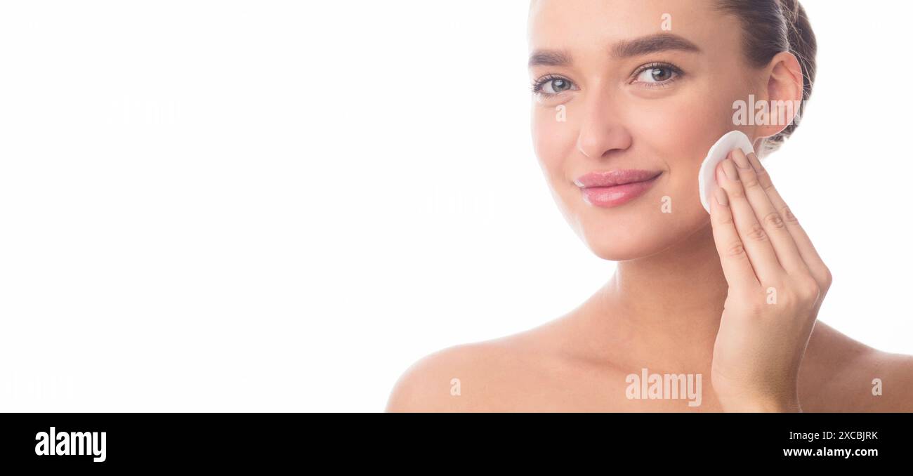 Woman Cleansing Face With Facial Cleanser on White Stock Photo - Alamy