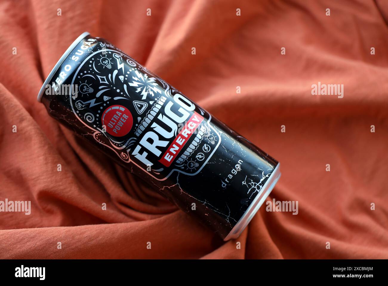 KYIV, UKRAINE - APRIL 20, 2024 Frugo energy drink in black tin can on ...