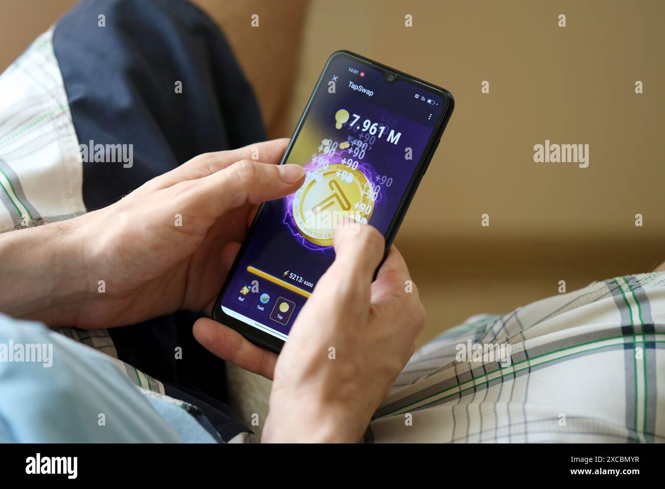 KYIV, UKRAINE - APRIL 20, 2024 Tap Swap telegram bot on smartphone ...