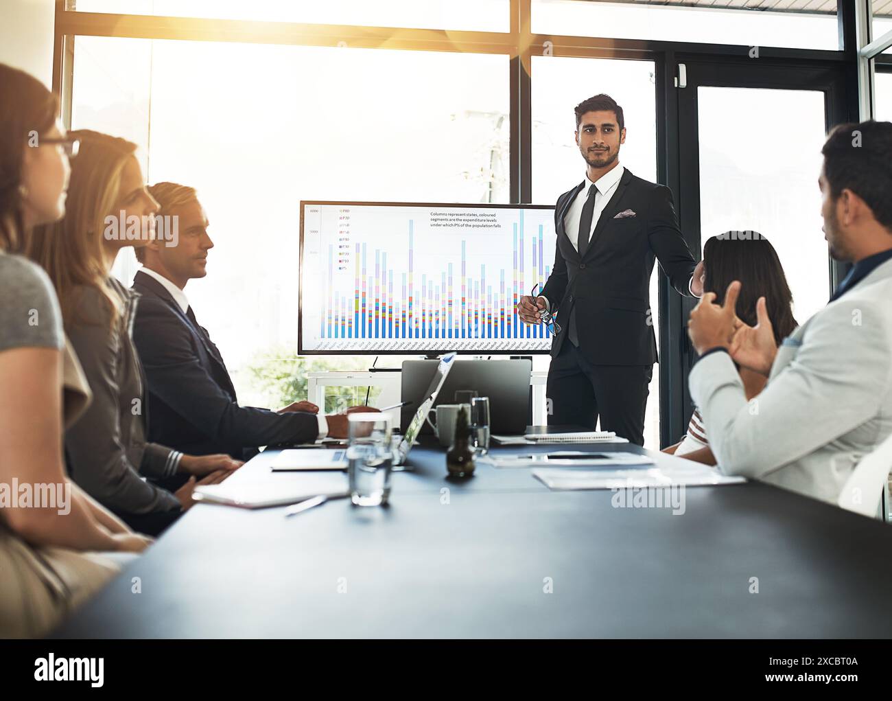 Businessman, people and presentation with analytics on screen for user ...