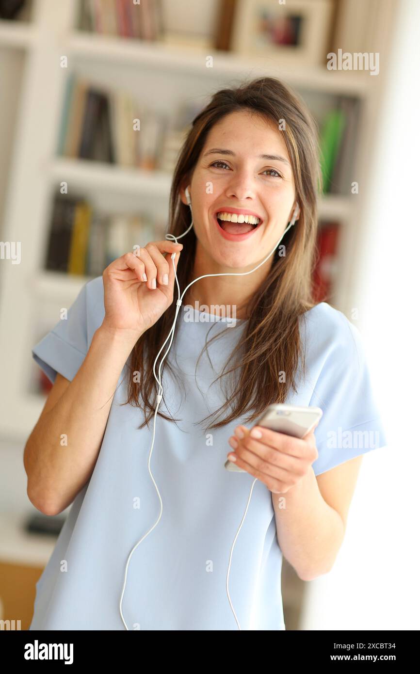Joyous young woman using hi-res stock photography and images - Alamy