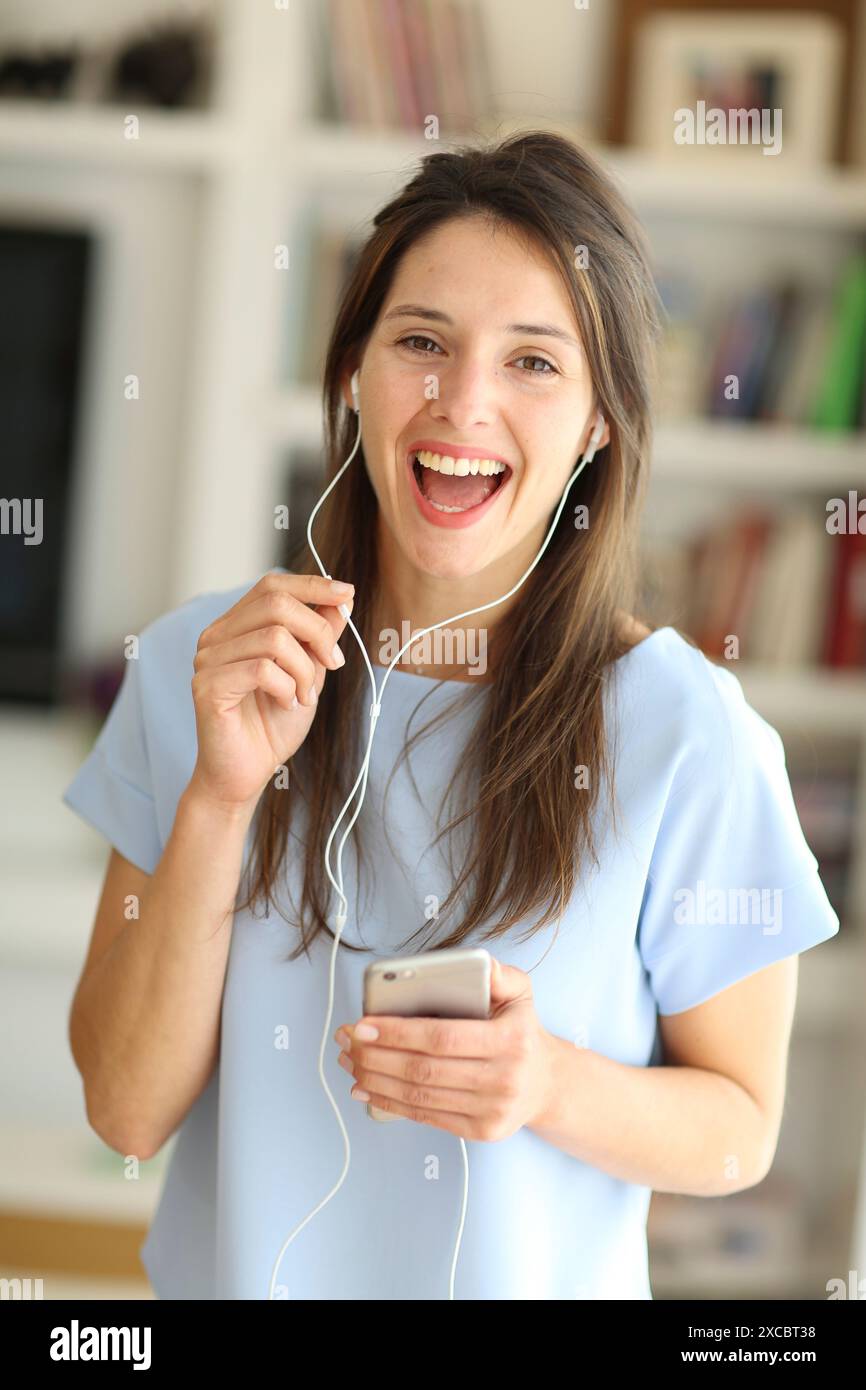 Joyous young woman using hi-res stock photography and images - Alamy