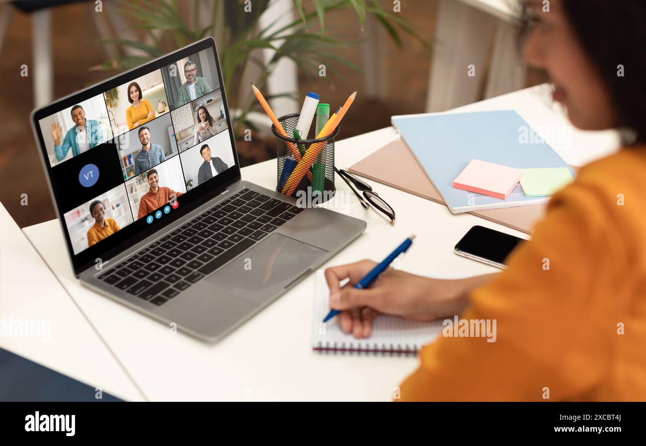 Taking notes during virtual meeting hi-res stock photography and images ...