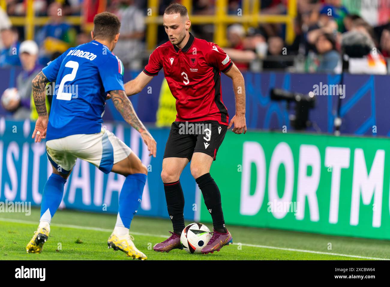 DORTMUND, GERMANY - JUNE 15: Giovanni Di Lorenzo of Italy battles for ...