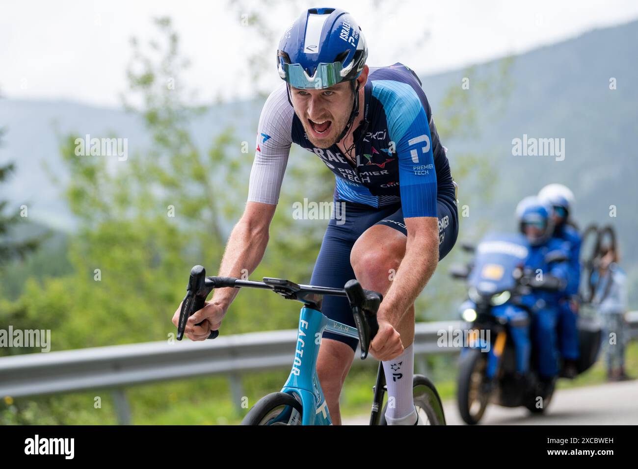 Derek Gee rides up the final climb to Plateau des Gliéres in Stage 8 of ...