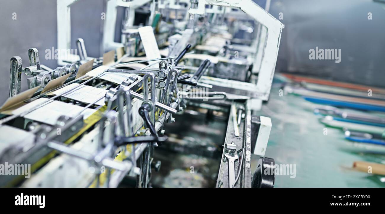 Paper press machine factory hi-res stock photography and images - Alamy