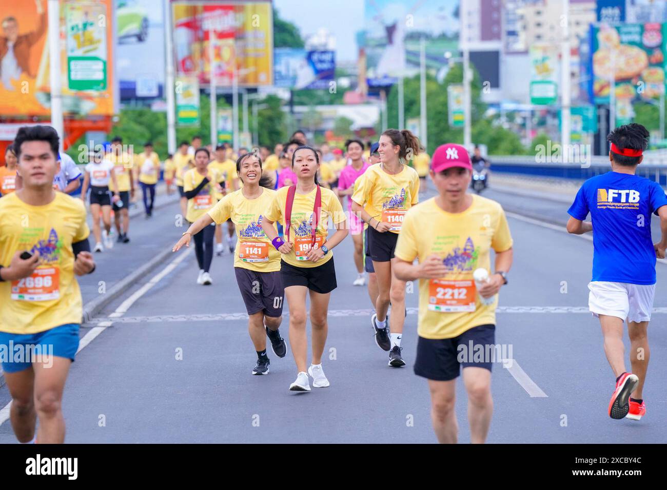 Phnom Penh. 16th June, 2024. People attend the 12th Phnom Penh International Half Marathon in ...