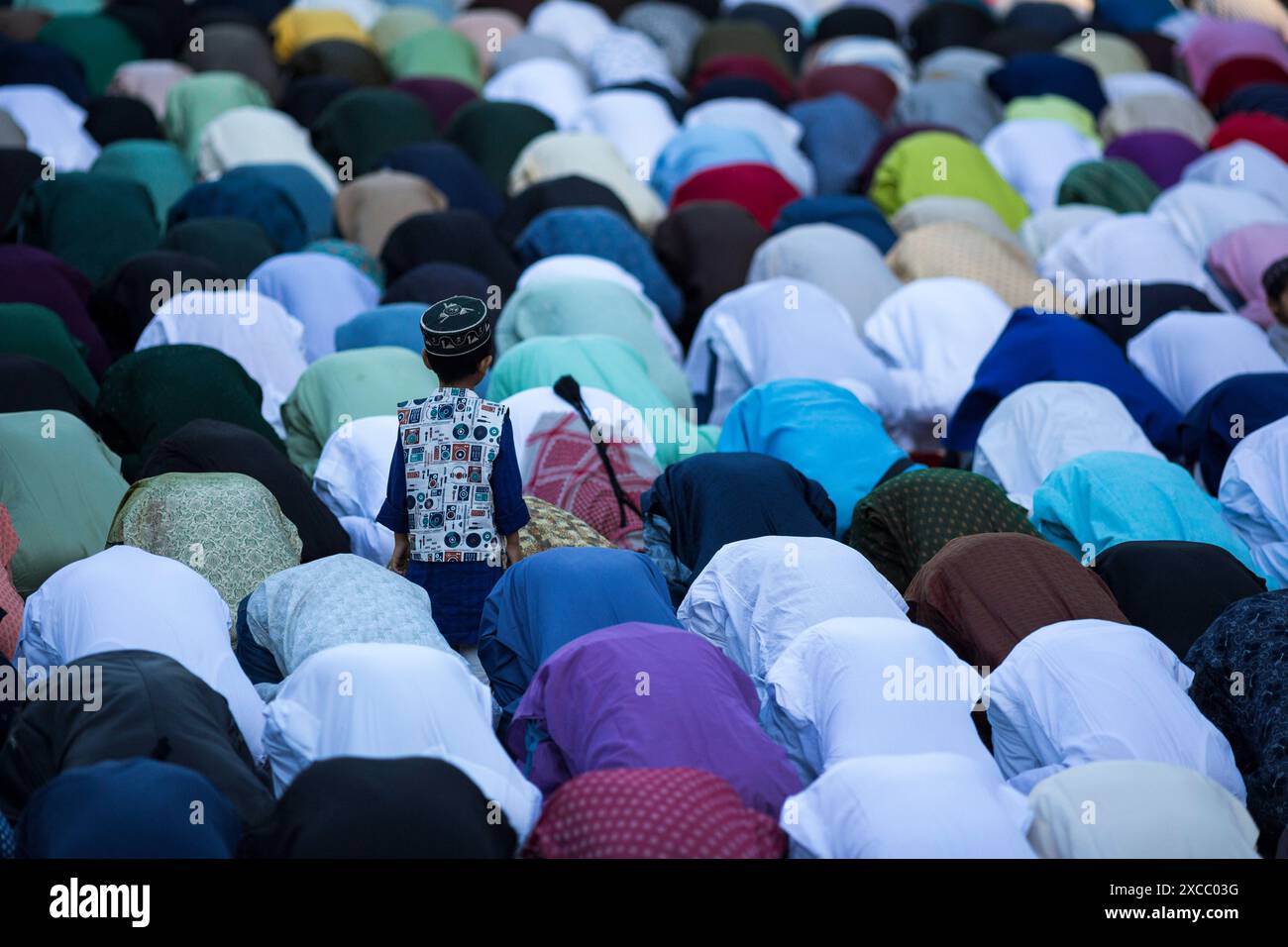 Madrid, Madrid, Spain. 16th June, 2024. A boy standing during prayer in ...