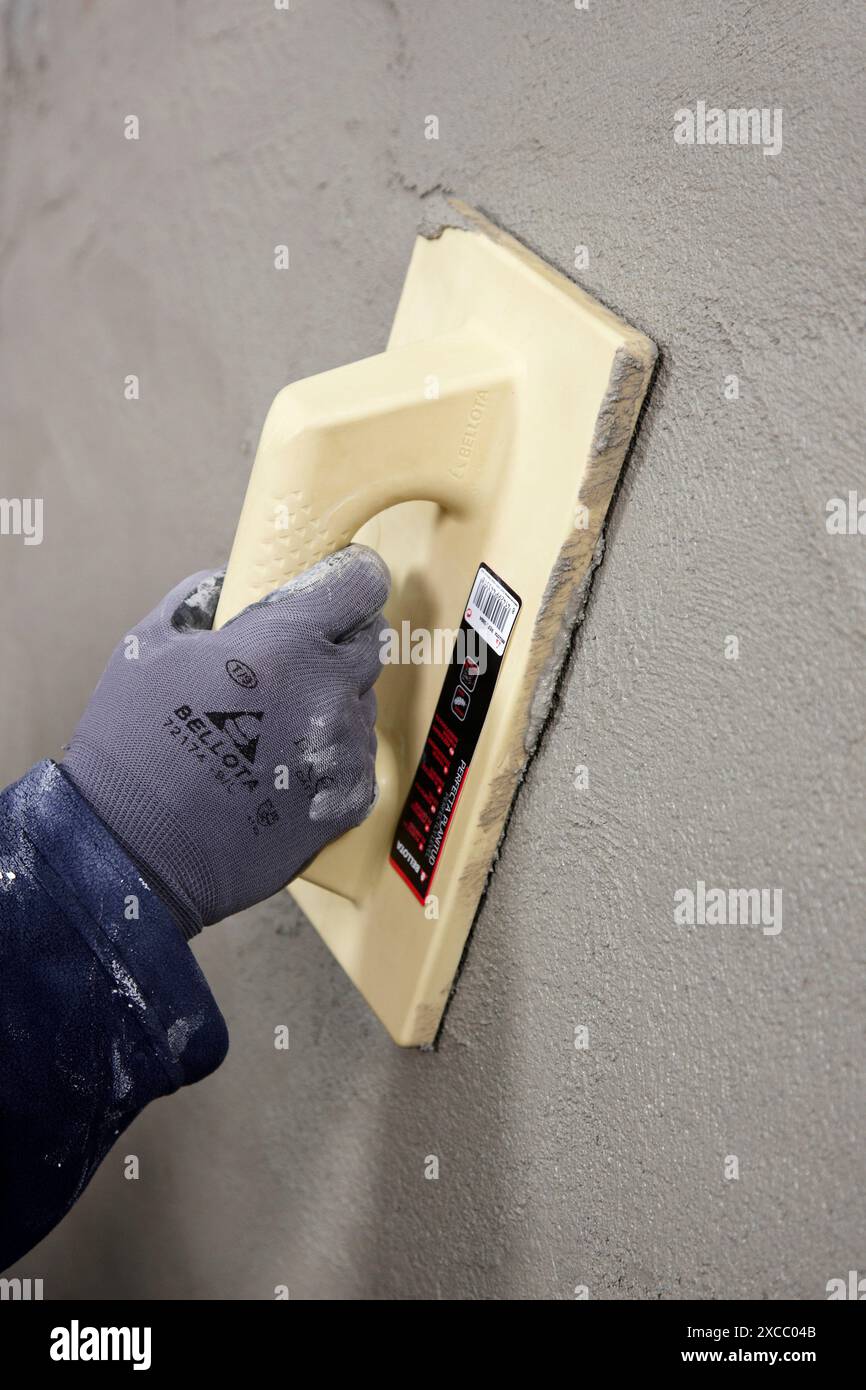 Roughcast, grout float, new homes under construction, construction site ...
