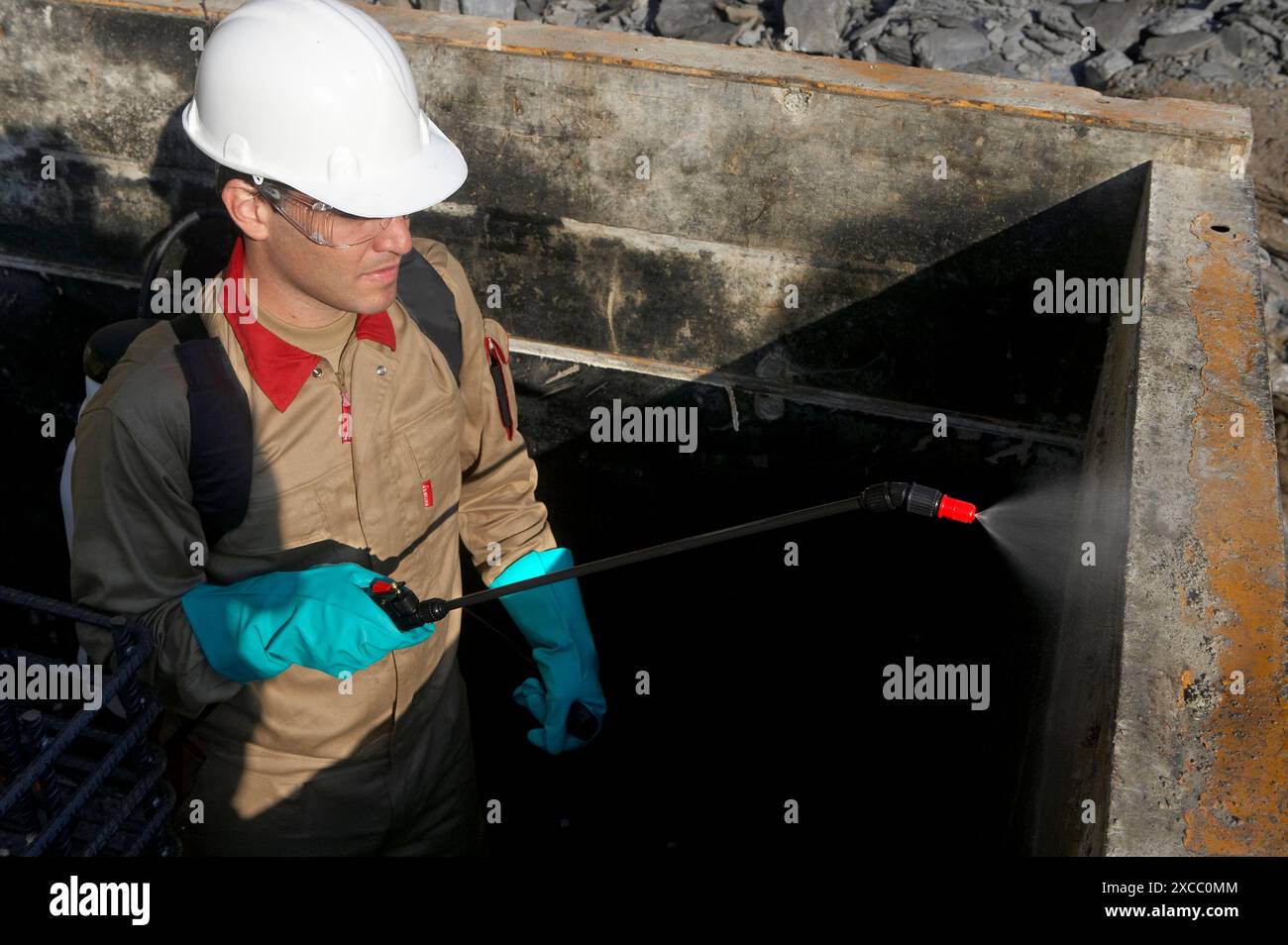 Applying form release agents with sprayer, concrete formworks Stock ...