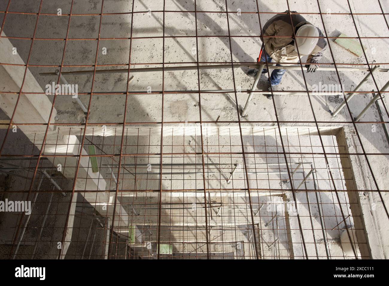 Construction worker, personal protective equipment, housing ...