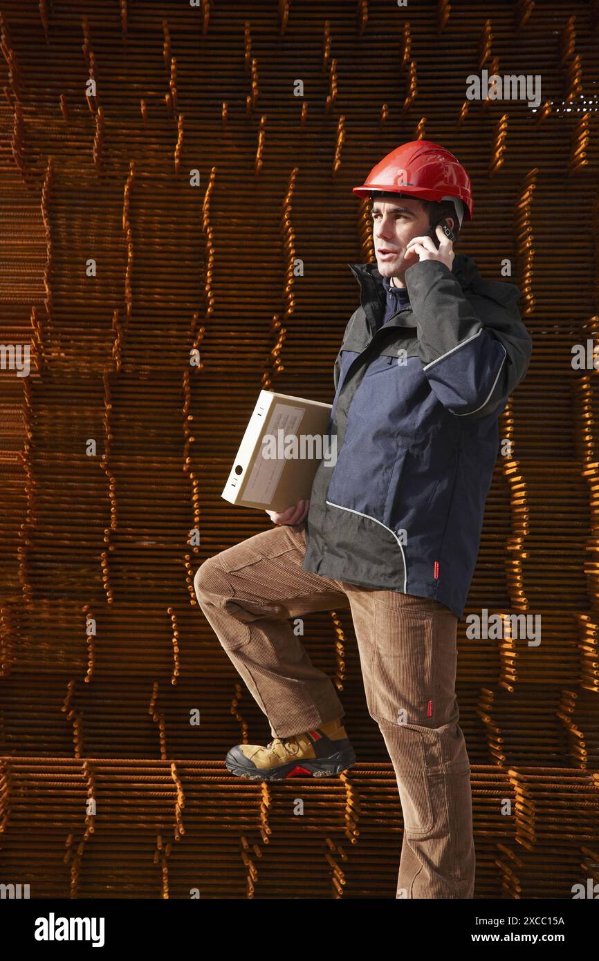 Architect, corrugated iron for formwork, housing construction Stock ...