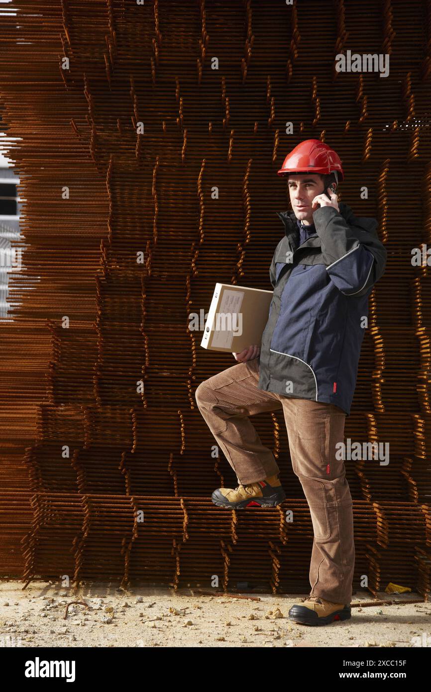 Architect, corrugated iron for formwork, housing construction Stock ...