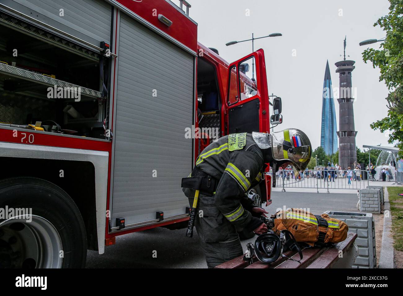 Fire service employees check equipment during the firemen's festival in ...