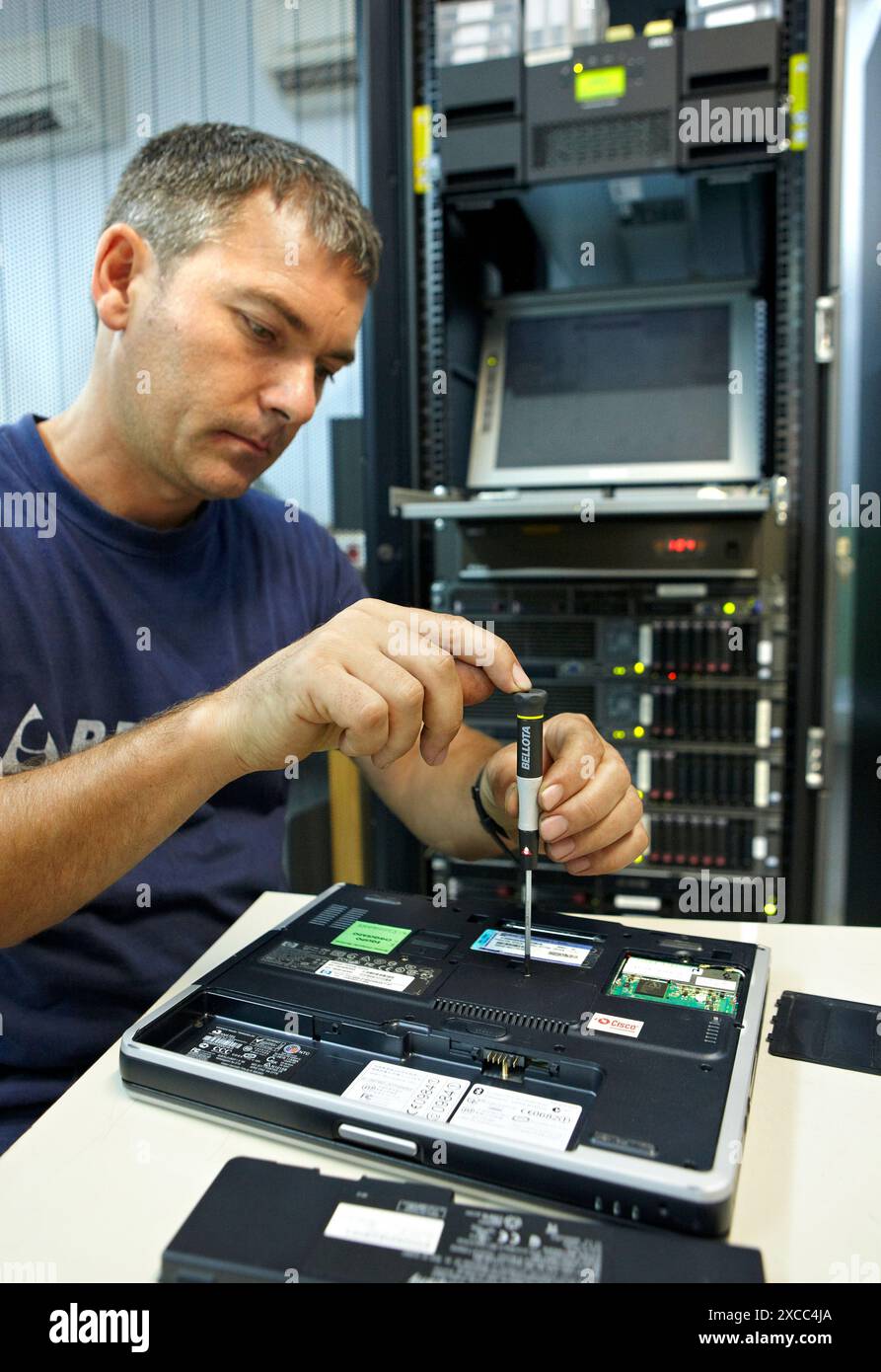 Precision screwdriver, computer maintenance Stock Photo - Alamy