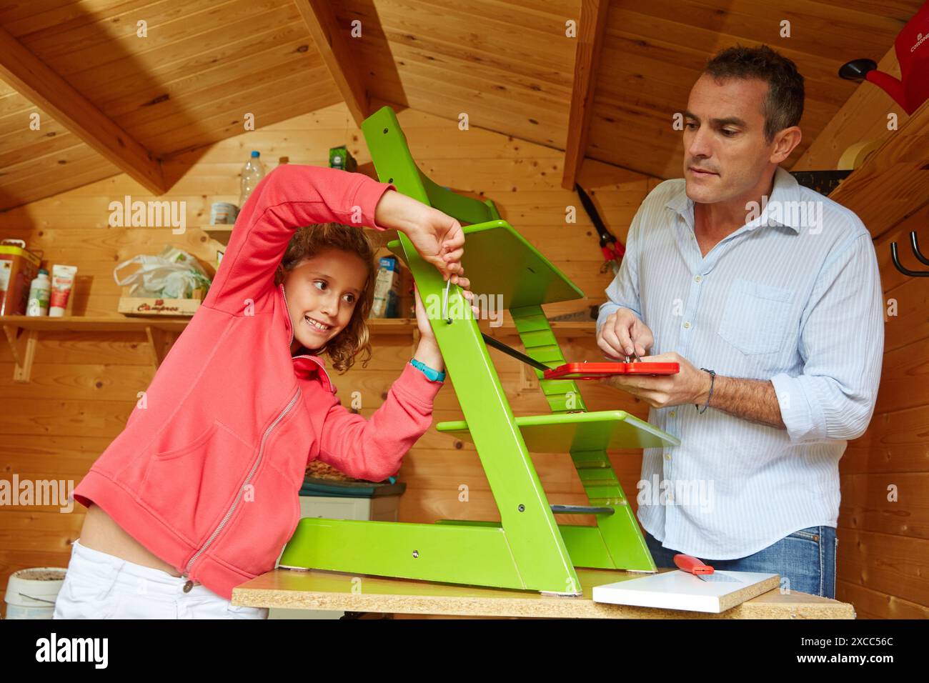 Man home stand up a chair hi-res stock photography and images - Alamy