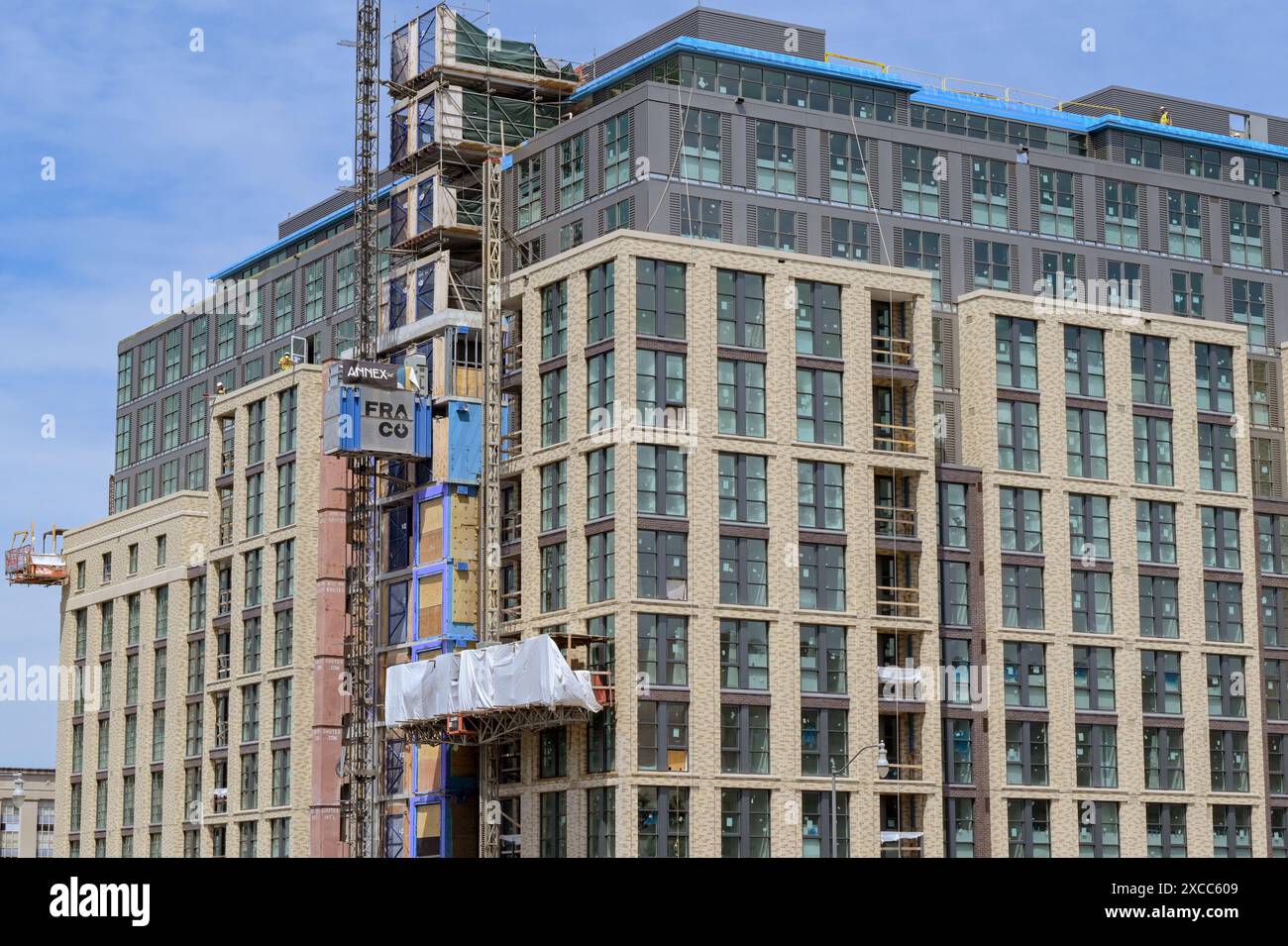 Washington DC, USA - 30 May 2024: New apartment building under construction in downtown ...