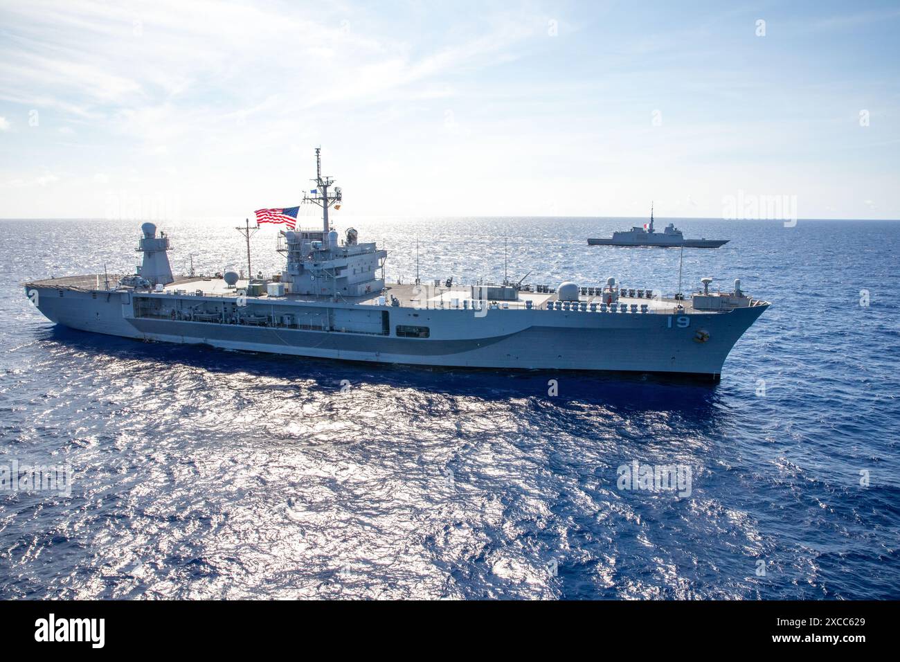 PHILIPPINE SEA (June 14, 2024) - U.S. Navy 7th Fleet Flagship USS Blue Ridge (LCC 19), left ...