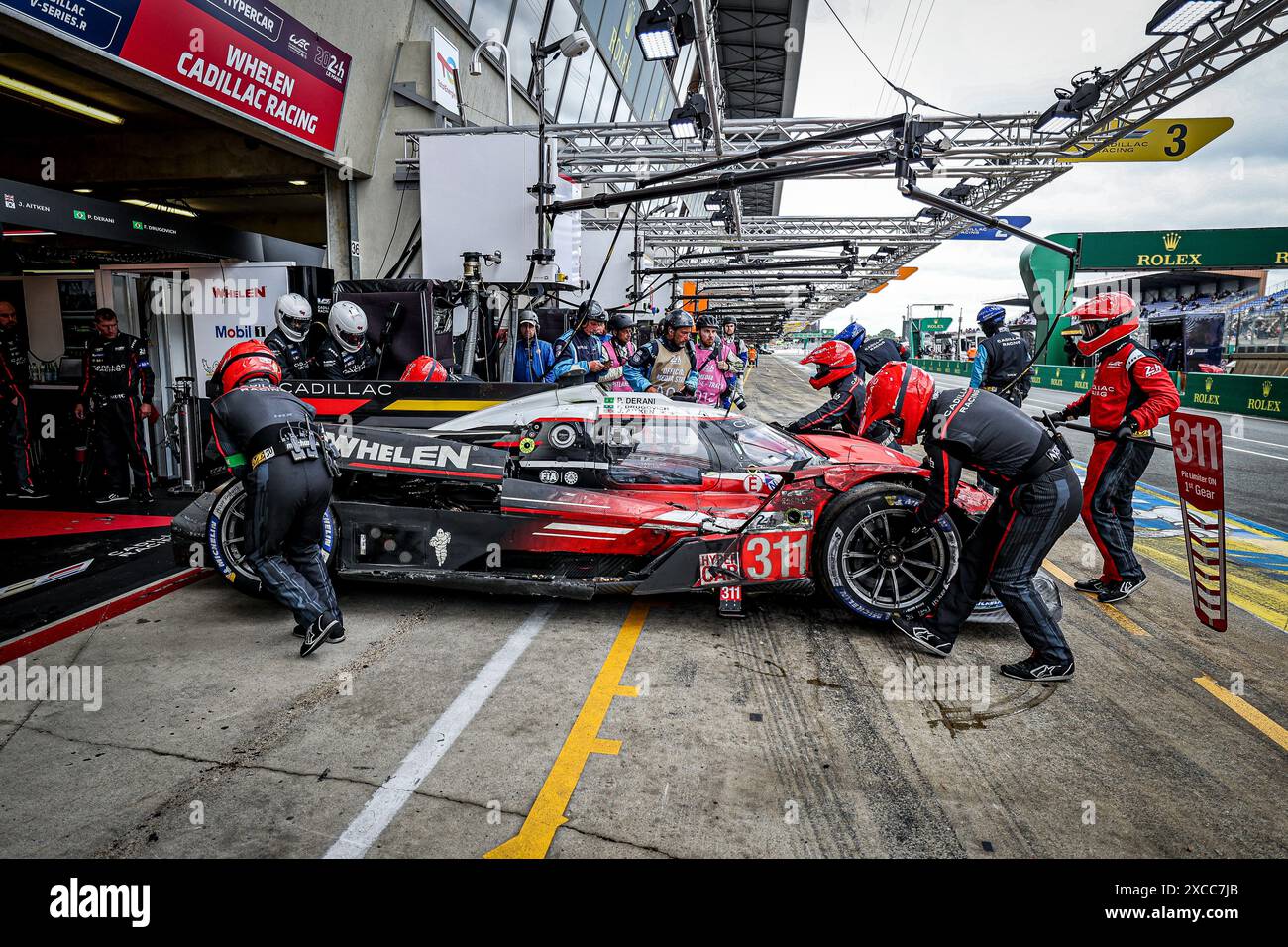 Le Mans, France. 16th June, 2024. pitlane, pitstop, arrêt aux stands reparation 311 DERANI Luis ...