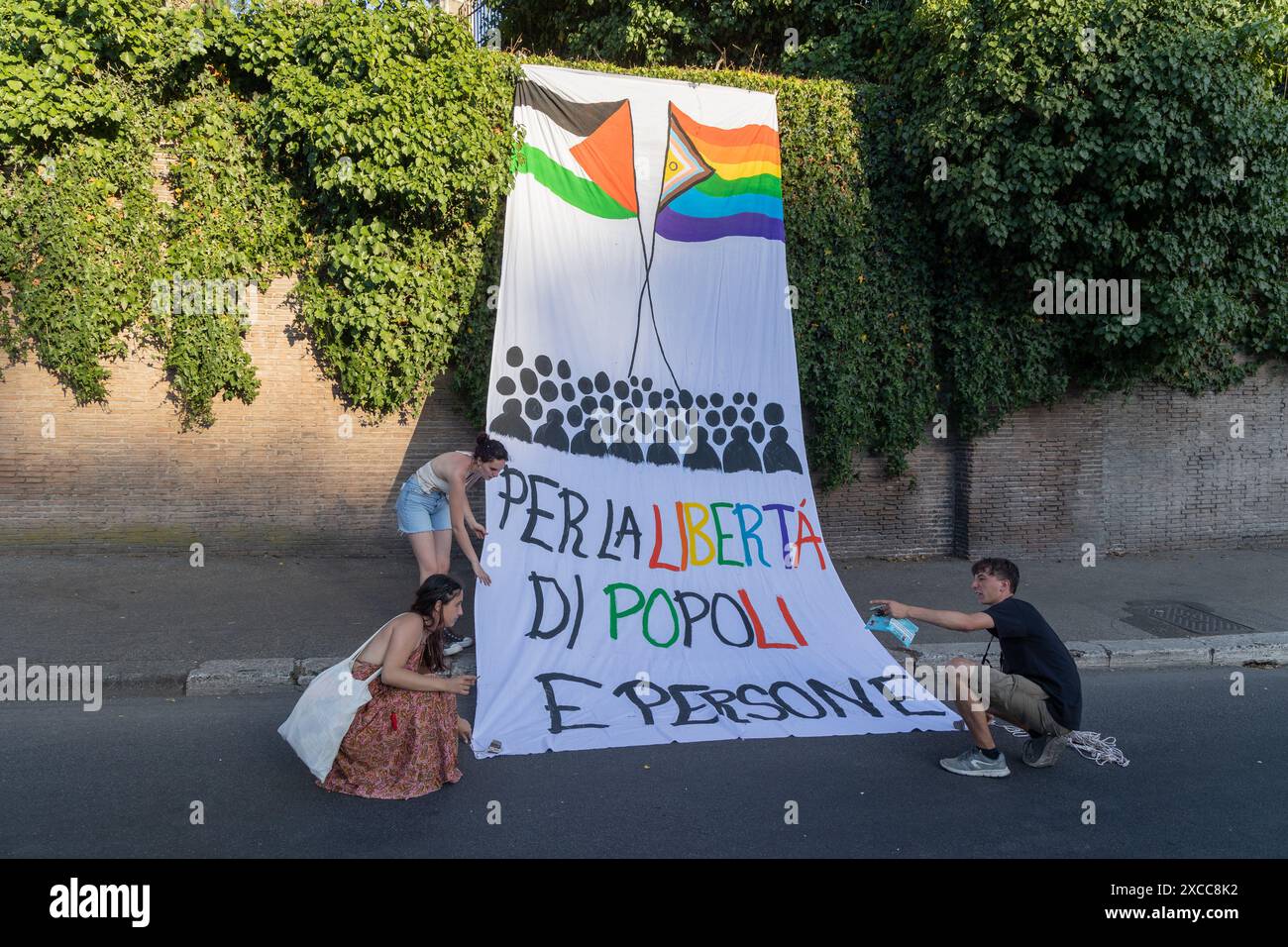 Rome, Italy. 15th June, 2024. LGBTQ activists show a banner during Roma ...