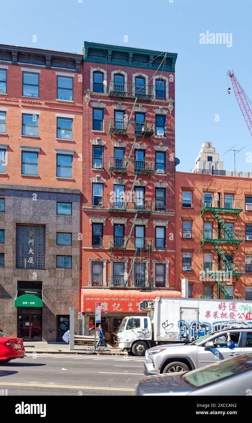 NYC Chinatown: 214 Canal Street is a seven-story tenement with street ...