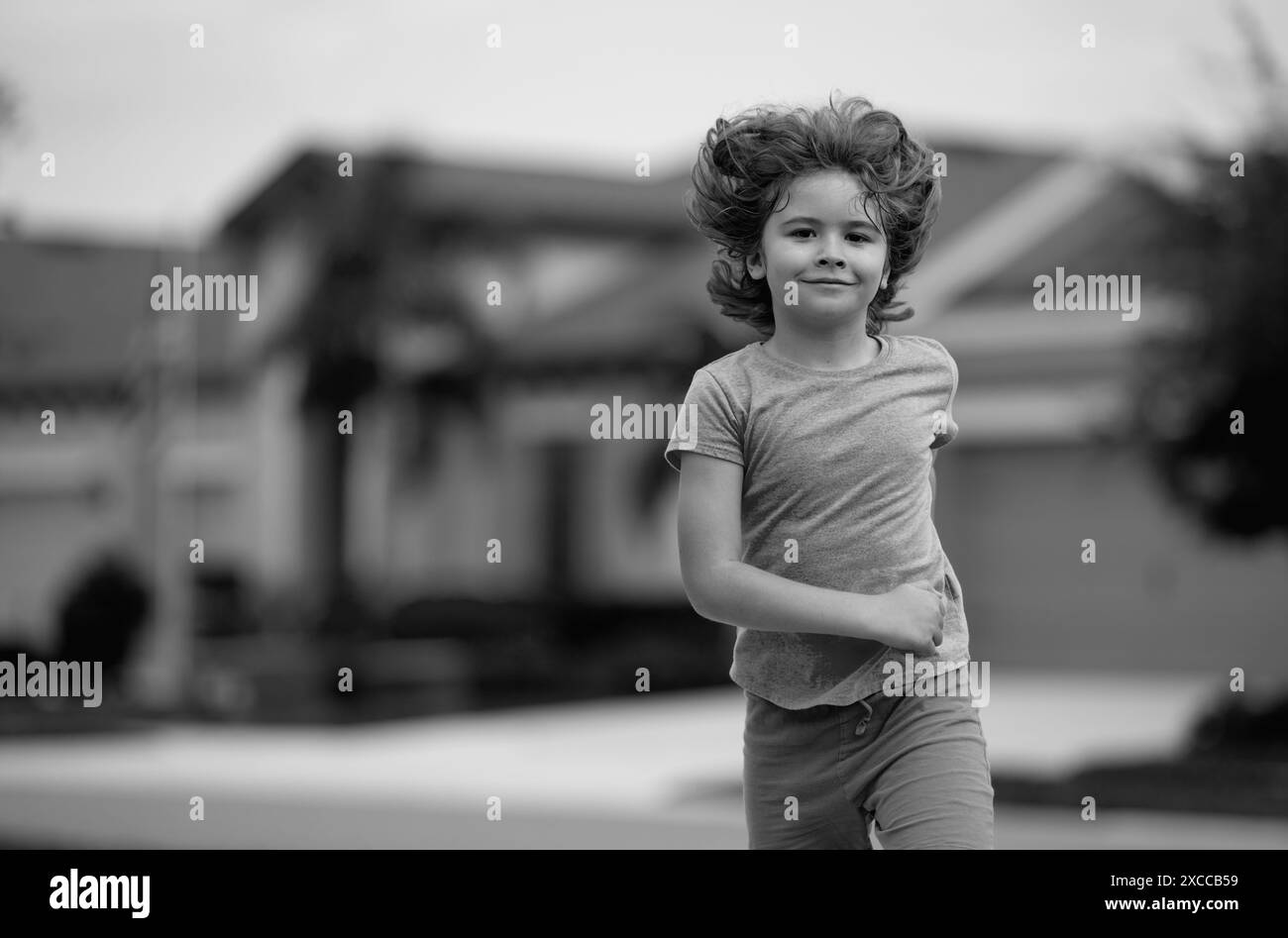 Kid running in summer street. Child enjoy run. Little boy running on ...