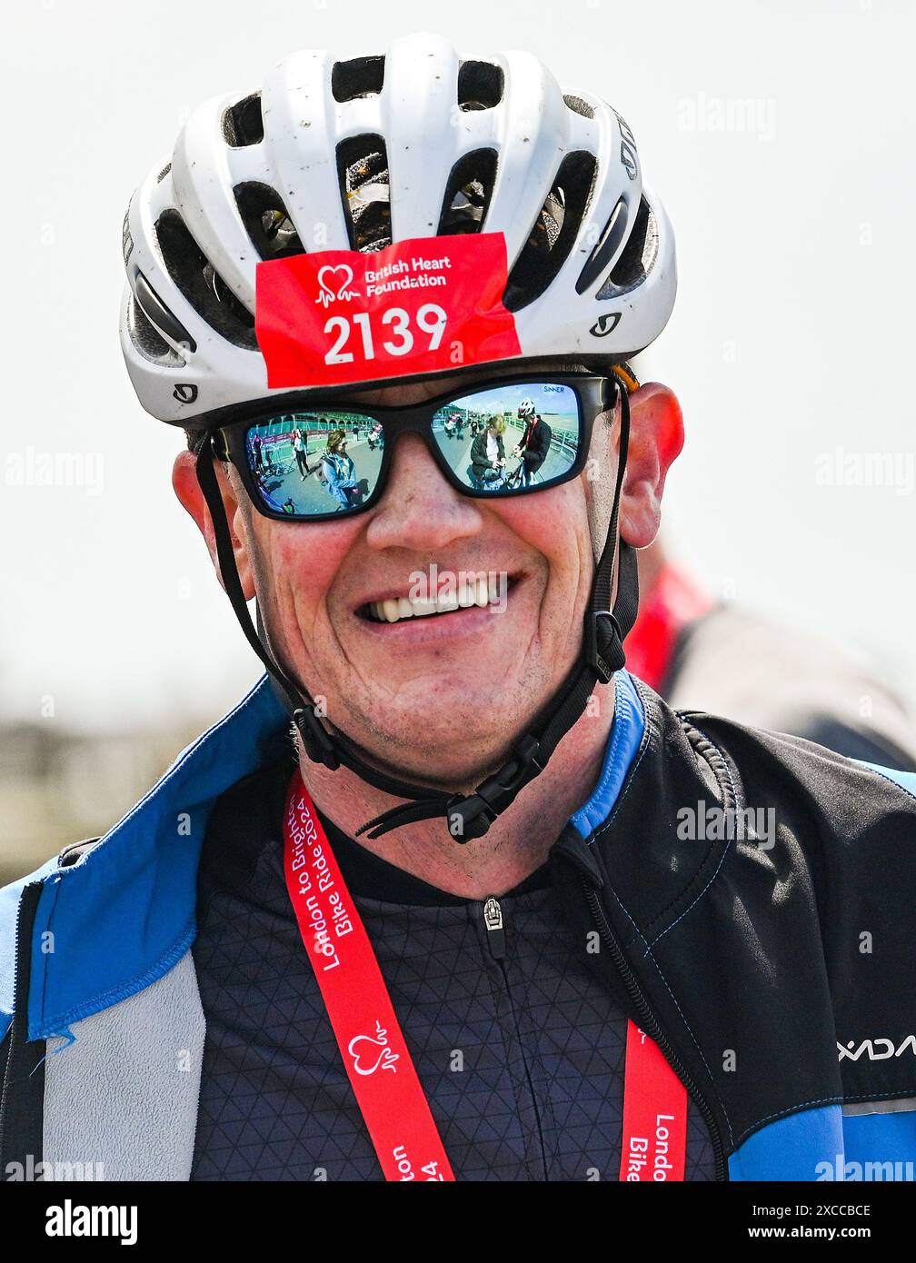 Brighton UK 16th June 2024 - All smiles for cyclists after finising the 54 mile British Heart ...