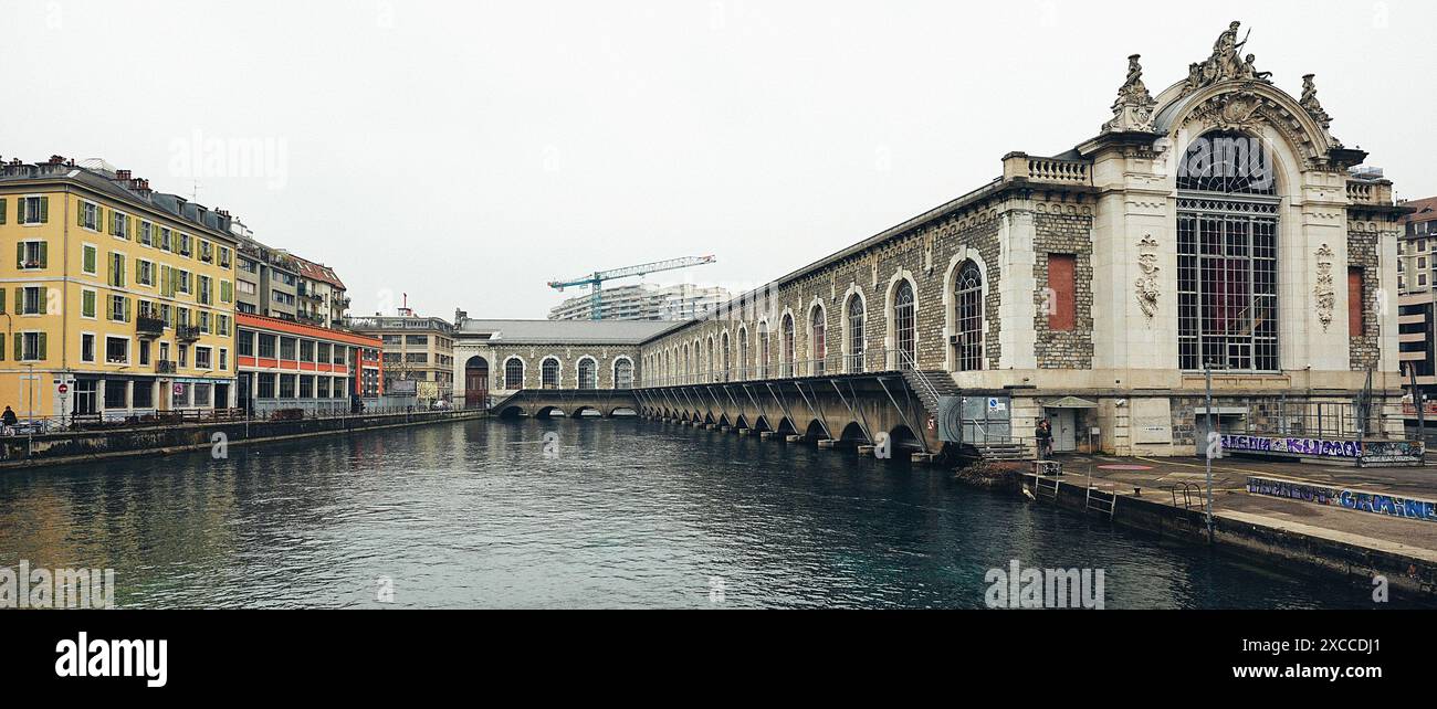 Historic riverside view in Geneva, showcasing elegant architecture and ...