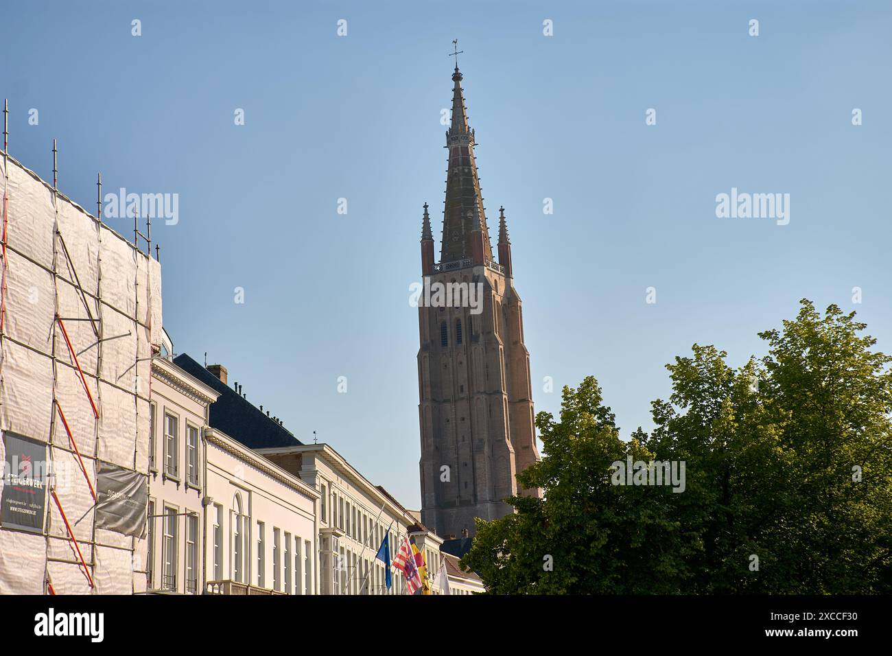 Bruges, Belgium; June,06,2024; The tower of the Gothic style Church of ...