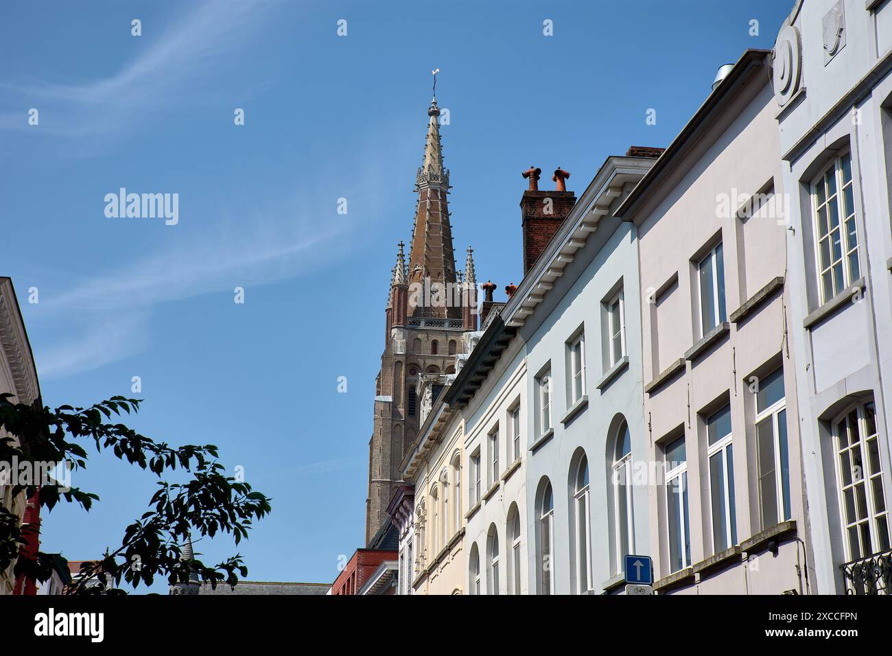 Bruges, Belgium; June,06,2024; The tower of the Gothic style Church of ...