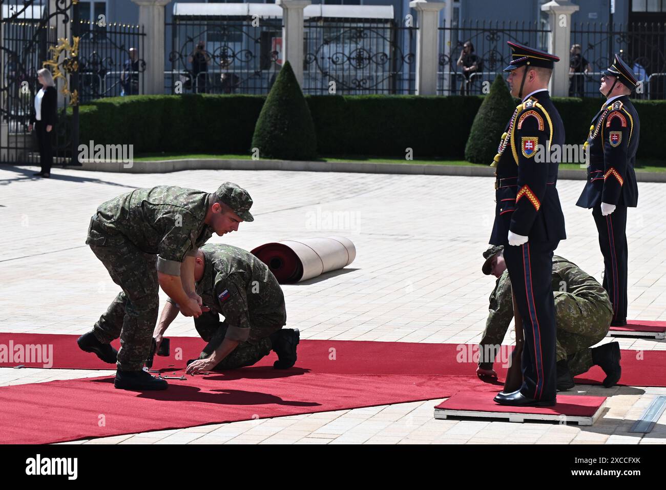 Bratislava, Slovakia. 15th June, 2024. Soldiers prepare a red carpet in ...