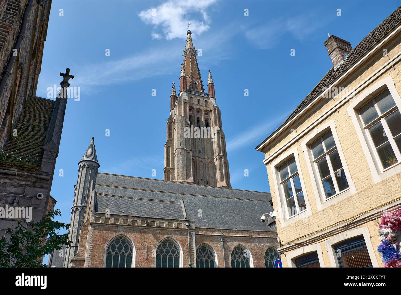 Bruges, Belgium; June,06,2024; The tower of the Gothic style Church of ...