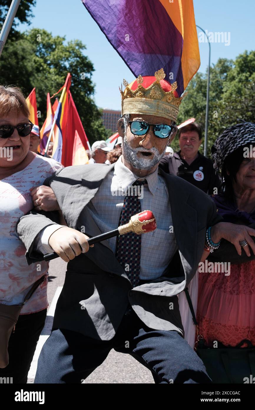 People protest during a march against the monarchy, the end of King ...